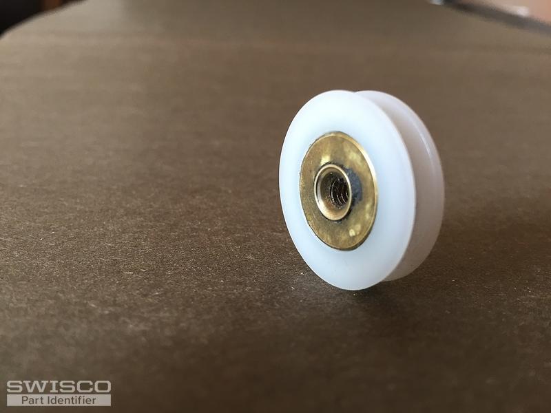 Help No one can identify a replacement for this roller with embedded nutbearing : SWISCO.com