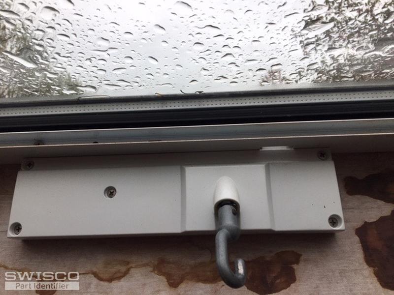 Installation of bracket from Swisco Part# 39-379 operator to skylight ...