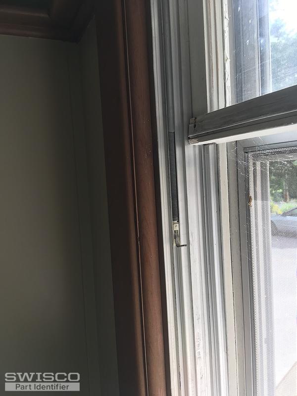 This part attaches to the tension spring to hold window up : SWISCO.com