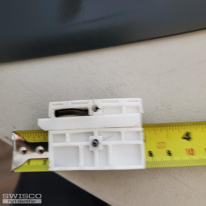 Tilt-in Window, plastic release. installed on the top of the bottom ...