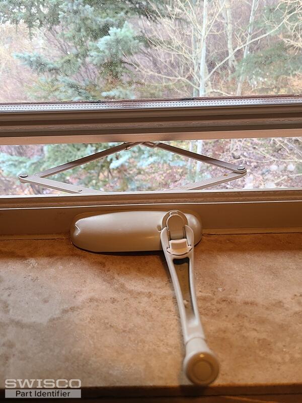 Part missing that attaches arm to window on window closing mechanism ...