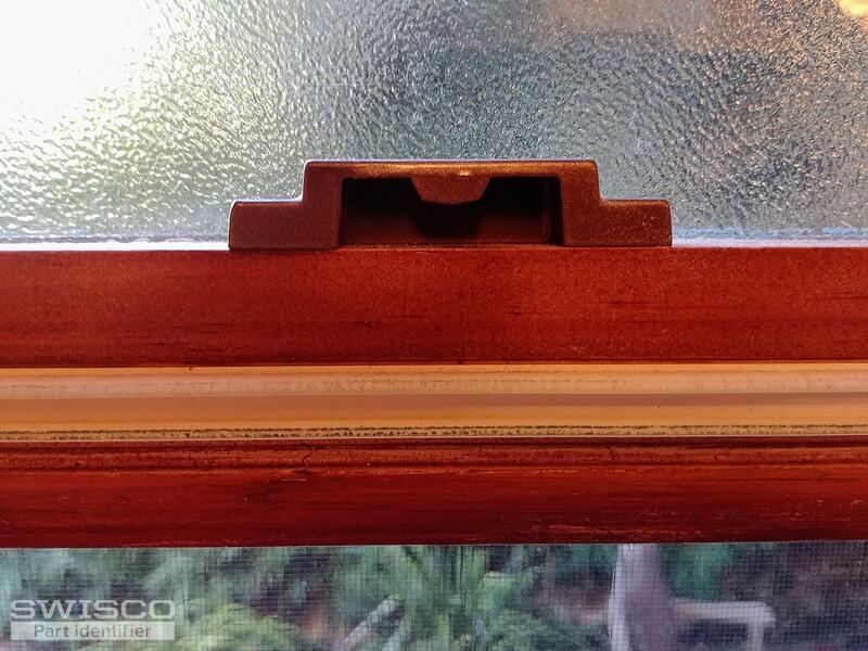Weather stripping on bottom rail of Marvin double hung wood tilt pac ...