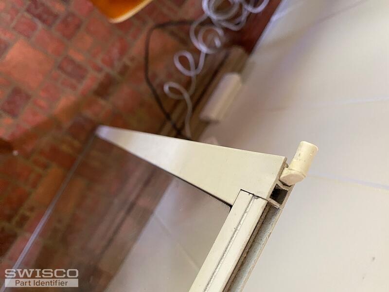 Storm window white plastic piece : SWISCO.com