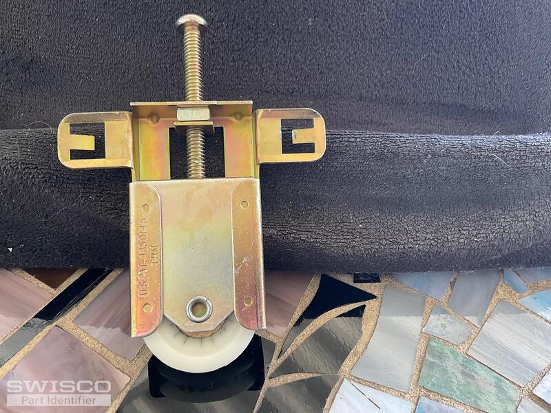 Lower roller for a mirrored closet door. PAT# 4850145 : SWISCO.com